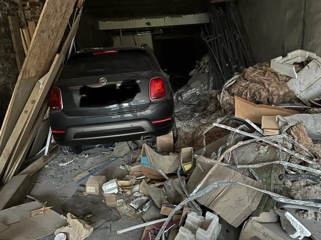 Emergency services called after car crashes through shop window ...